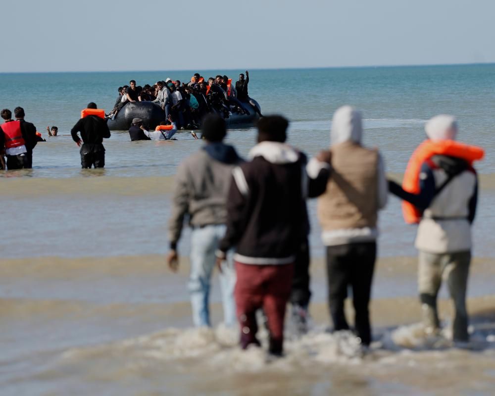 Asylum seekers deported to France live in fear of…