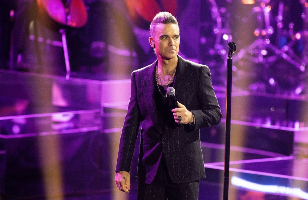 Robbie Williams jokingly removes himself from the…