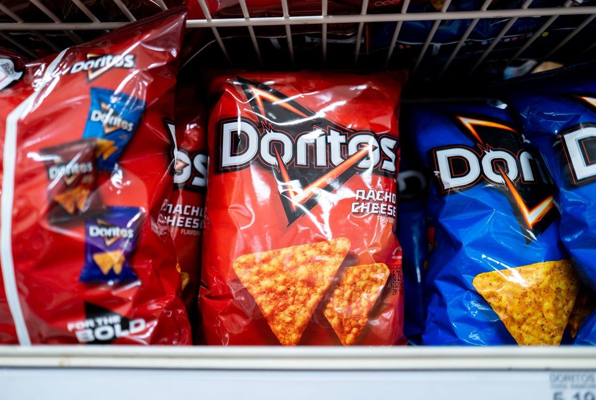 Cheetos and Doritos are turning down the orange color…