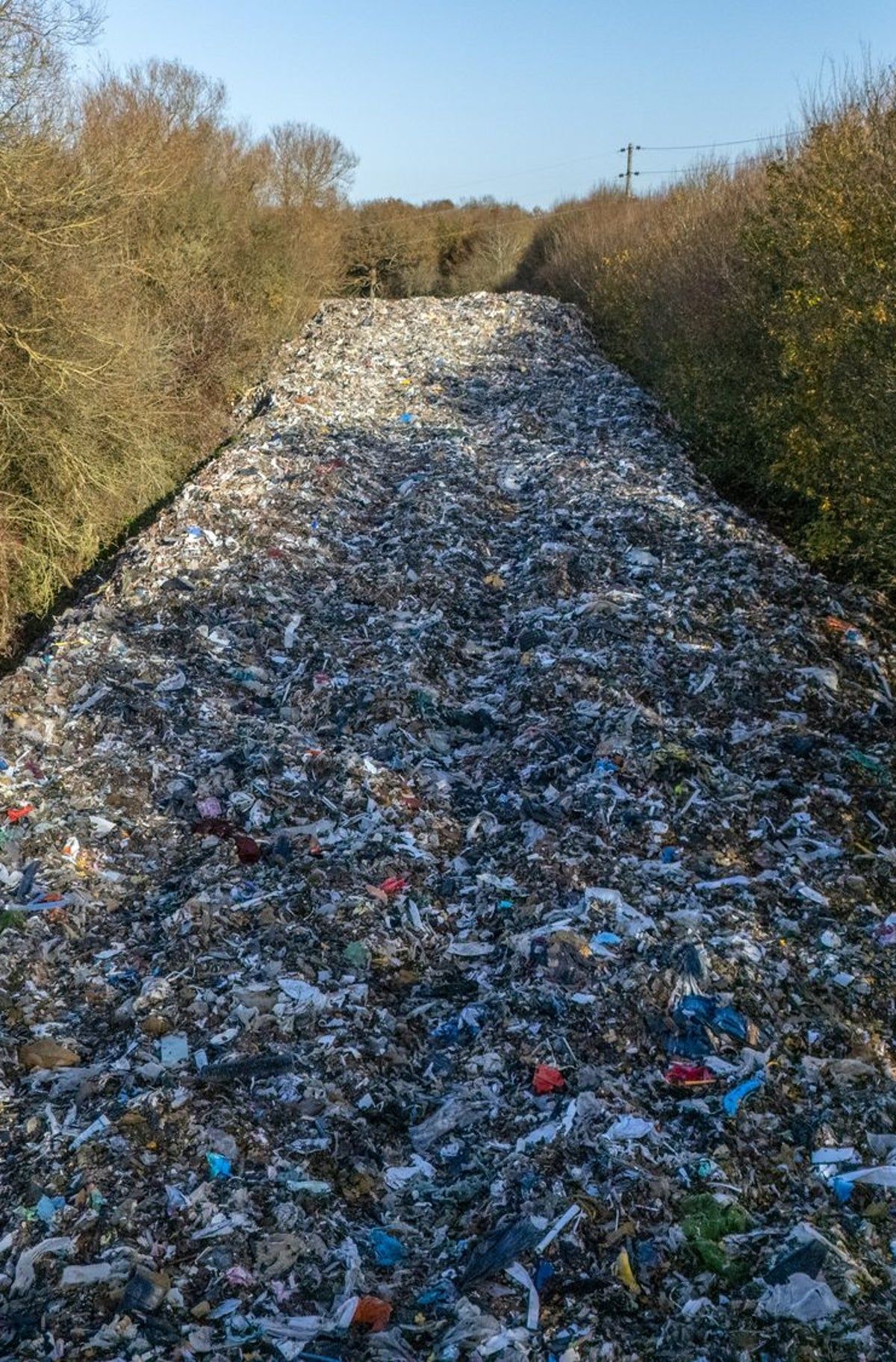 Fears as ‘obscene’ fly-tipped rubbish dump drifts…