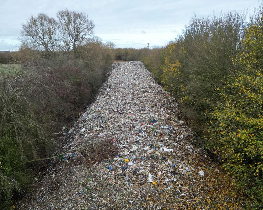 Mountain of waste dumped in Oxfordshire field contains…