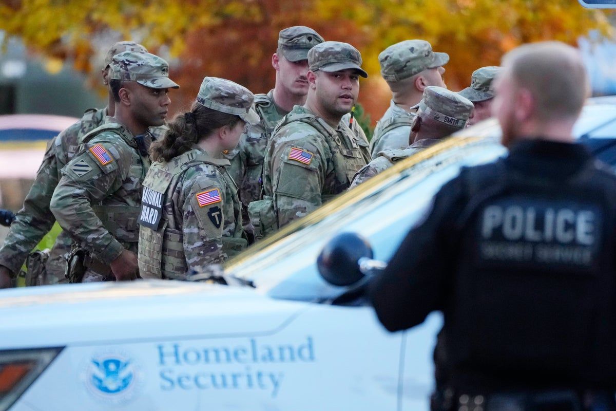 Photos from the scene where 2 National Guard members…