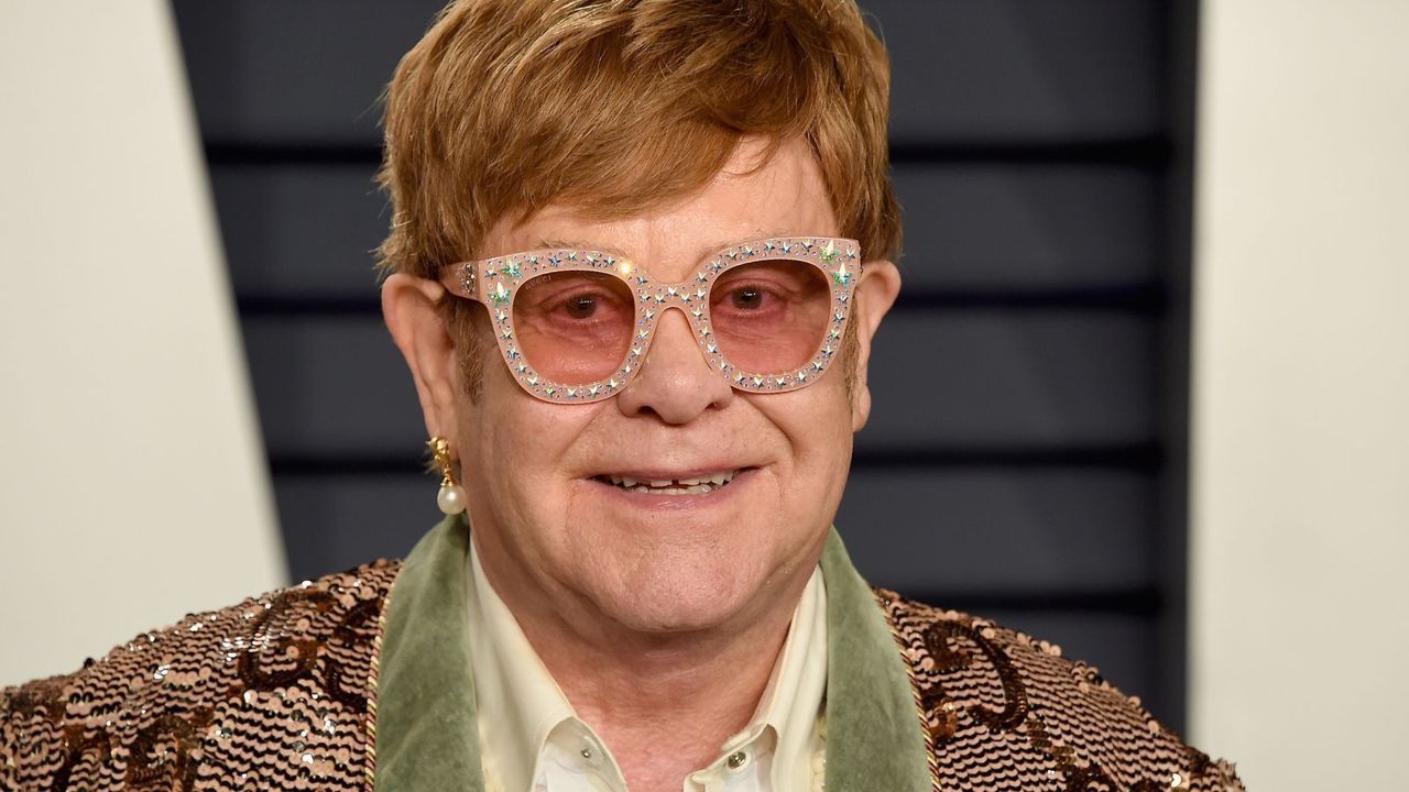 Elton John’s Cheerful Yet Elegant Yellow Cabinets Show…