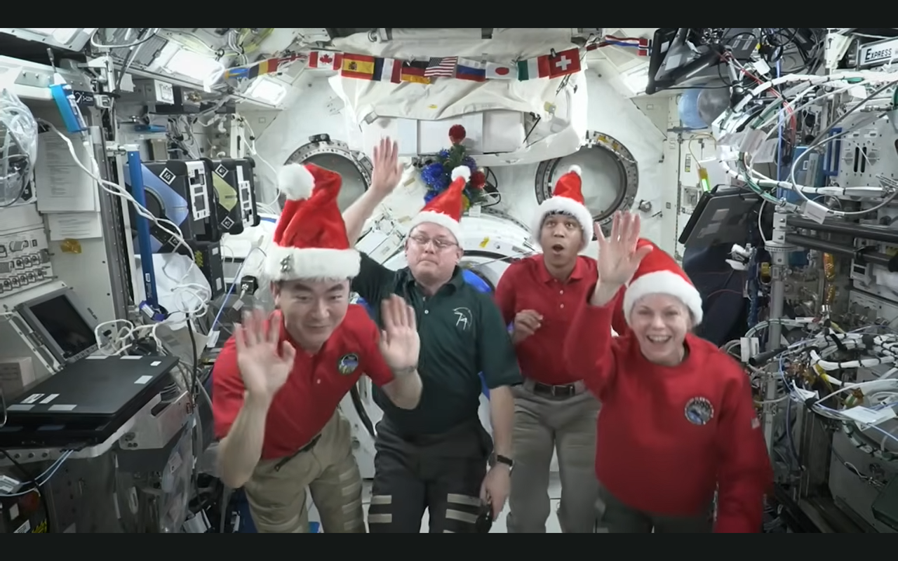 Astronauts beam home Christmas wishes from…