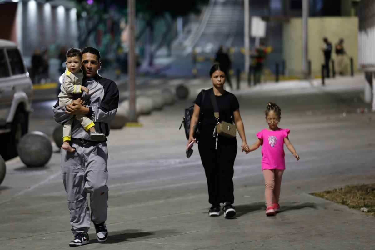Photos show residents evacuating after explosions in…