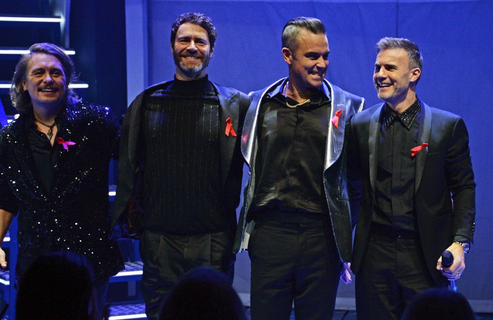 Robbie Williams teases Take That reunion