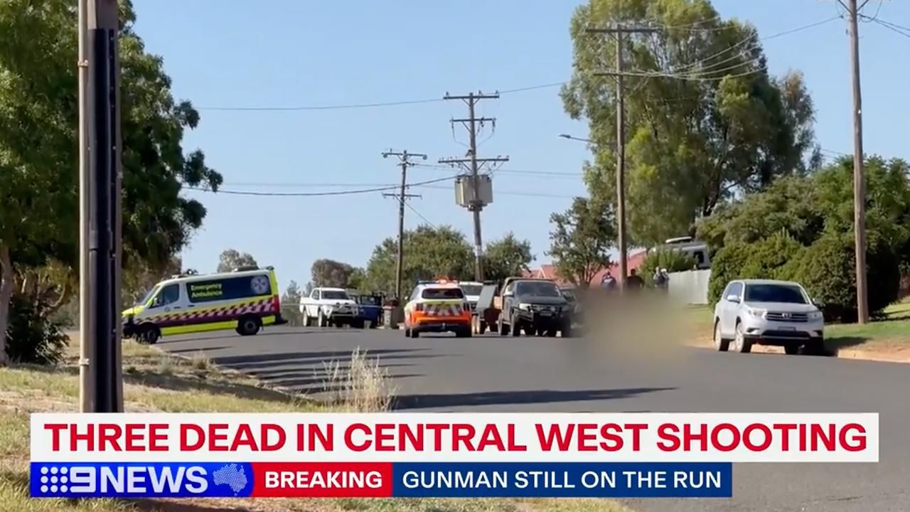 Gunman on the run after three people shot dead