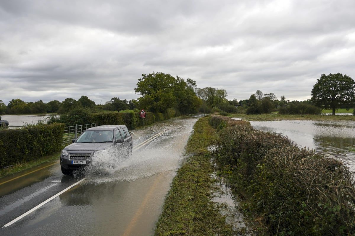 Three people rescued from vehicles as heavy rain…