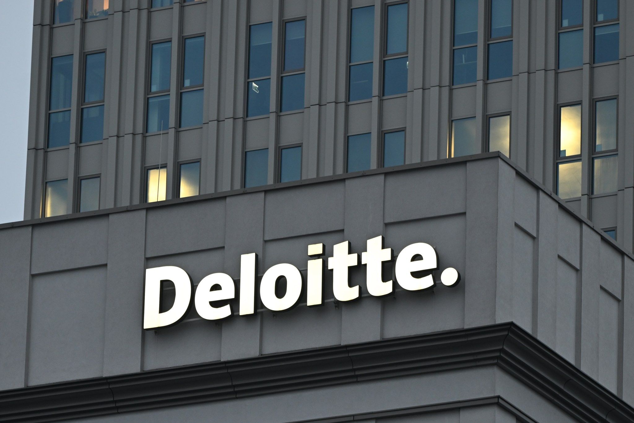 Deloitte to scrap traditional job titles as AI ushers…