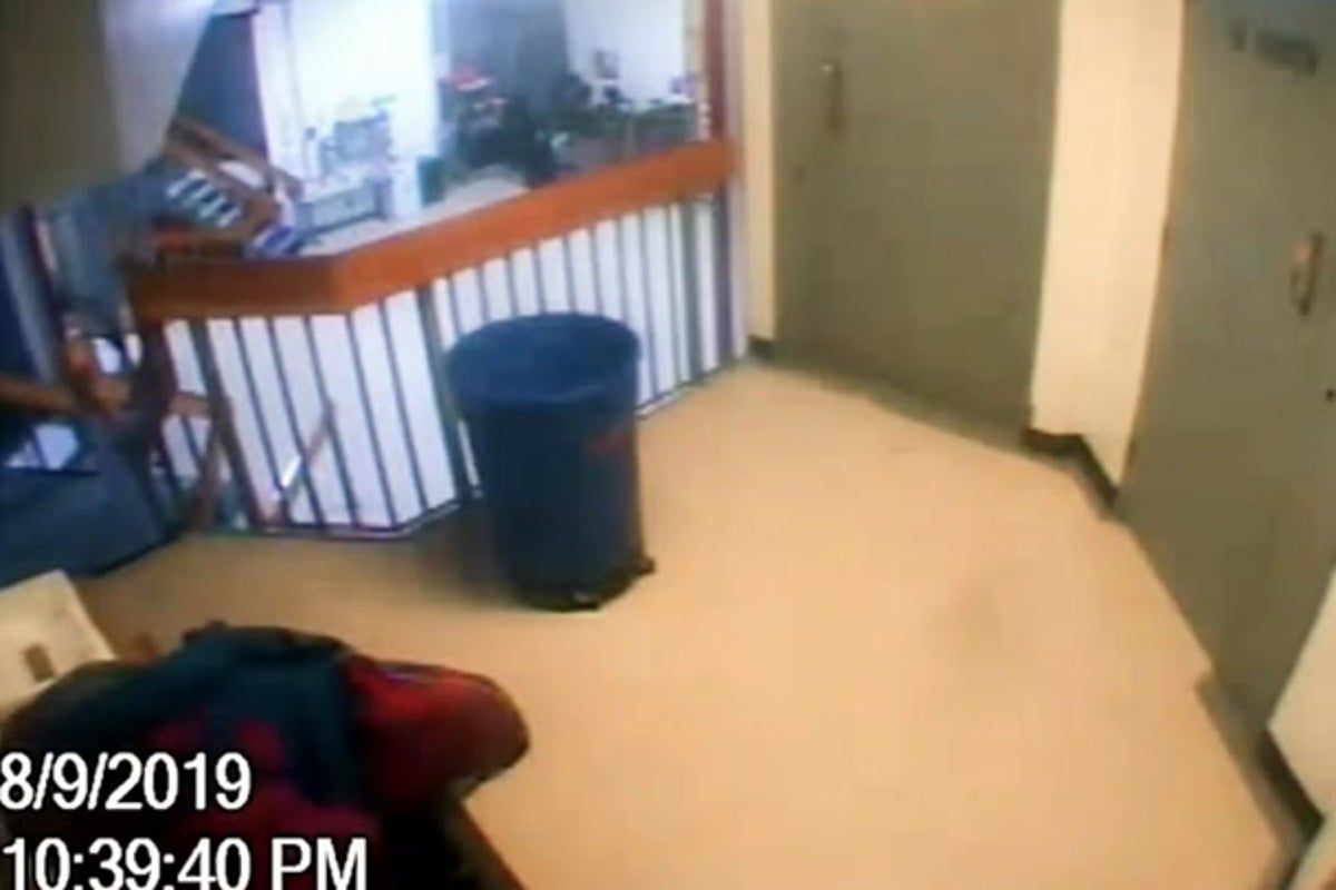 Surveillance footage shows orange flash outside…