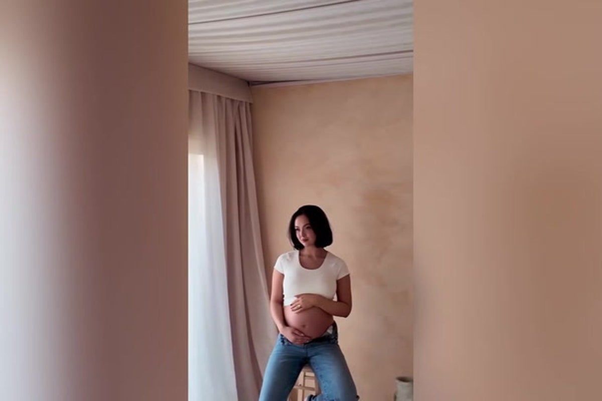 Love Island star shows off baby bump in surprise…