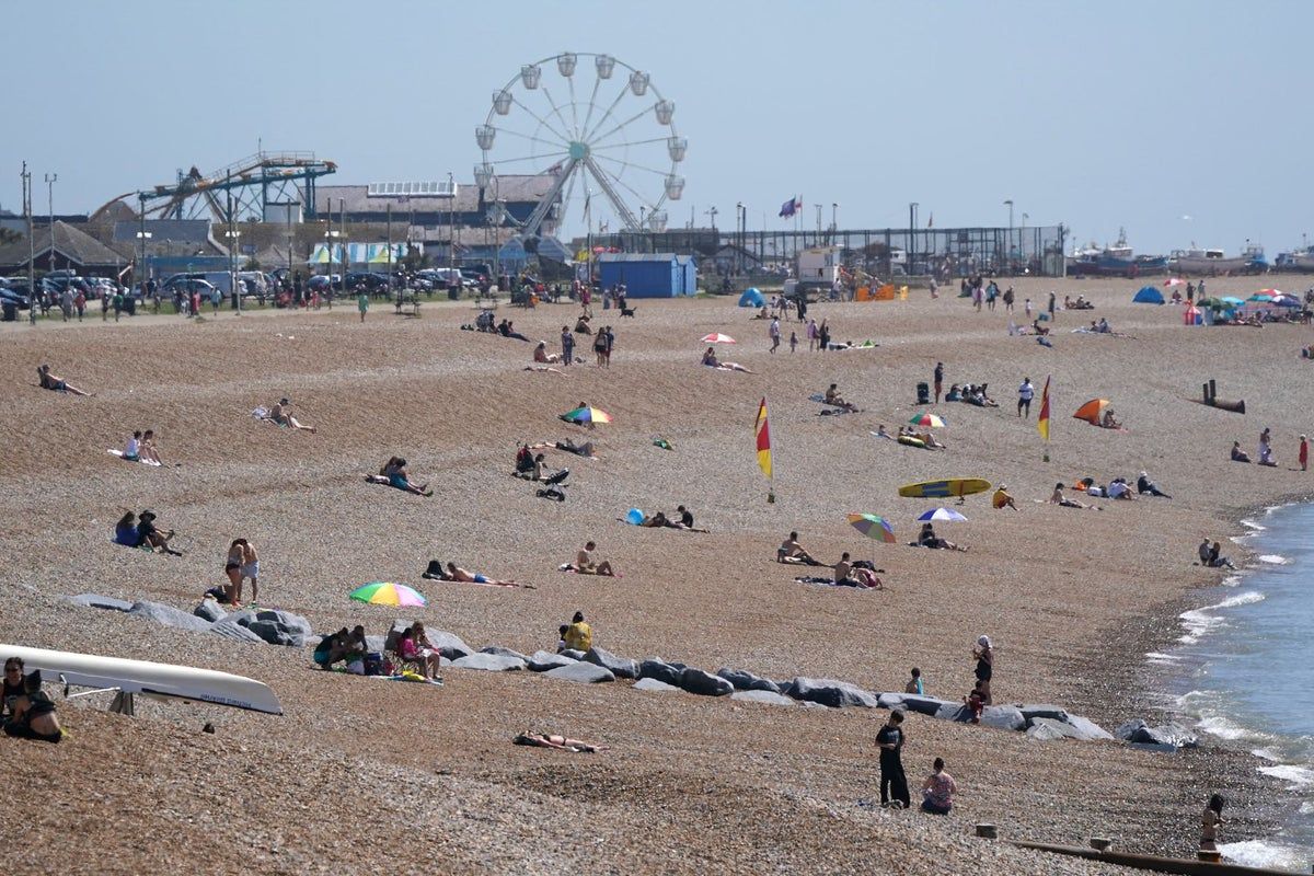 Man dies on packed beach on hottest day of the year…