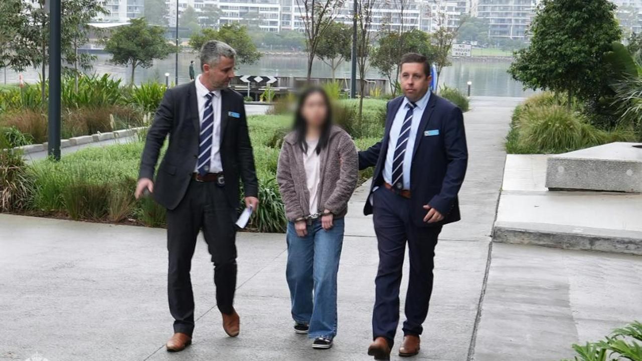 Finance workers charged over luxury 'ghost cars' scheme