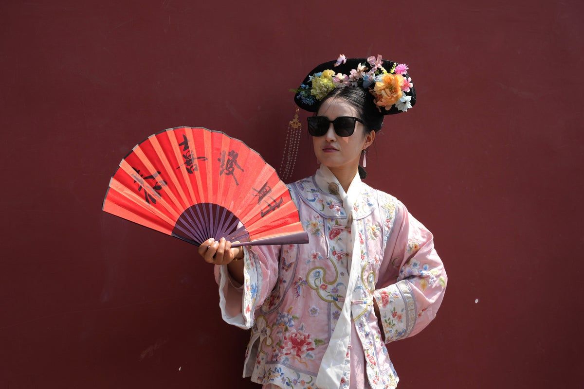 Dressing visitors in ancient China's imperial splendor…