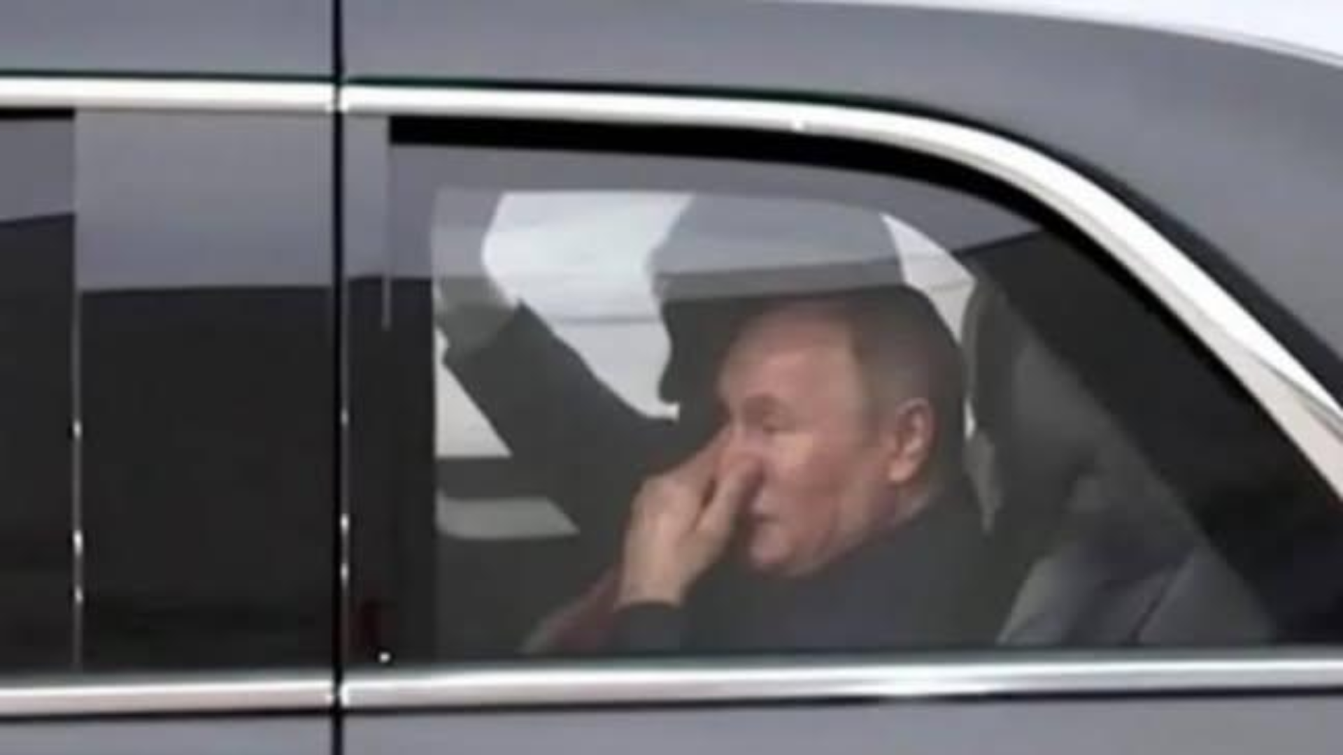 'Let's Ask Putin': Viral Photo of Putin Covering His…