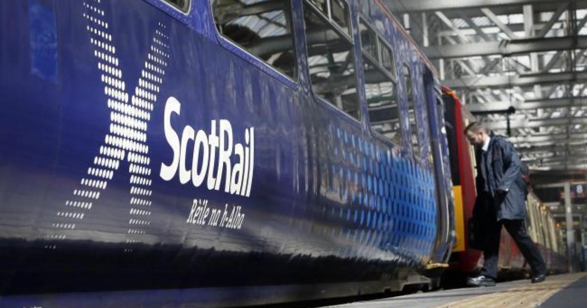 Busy train line closes after car hits bridge as…
