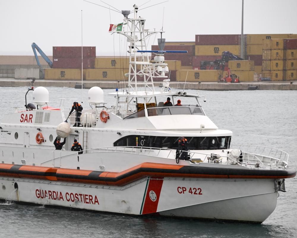 Italian rescuers recover 10 bodies after migrant boat…