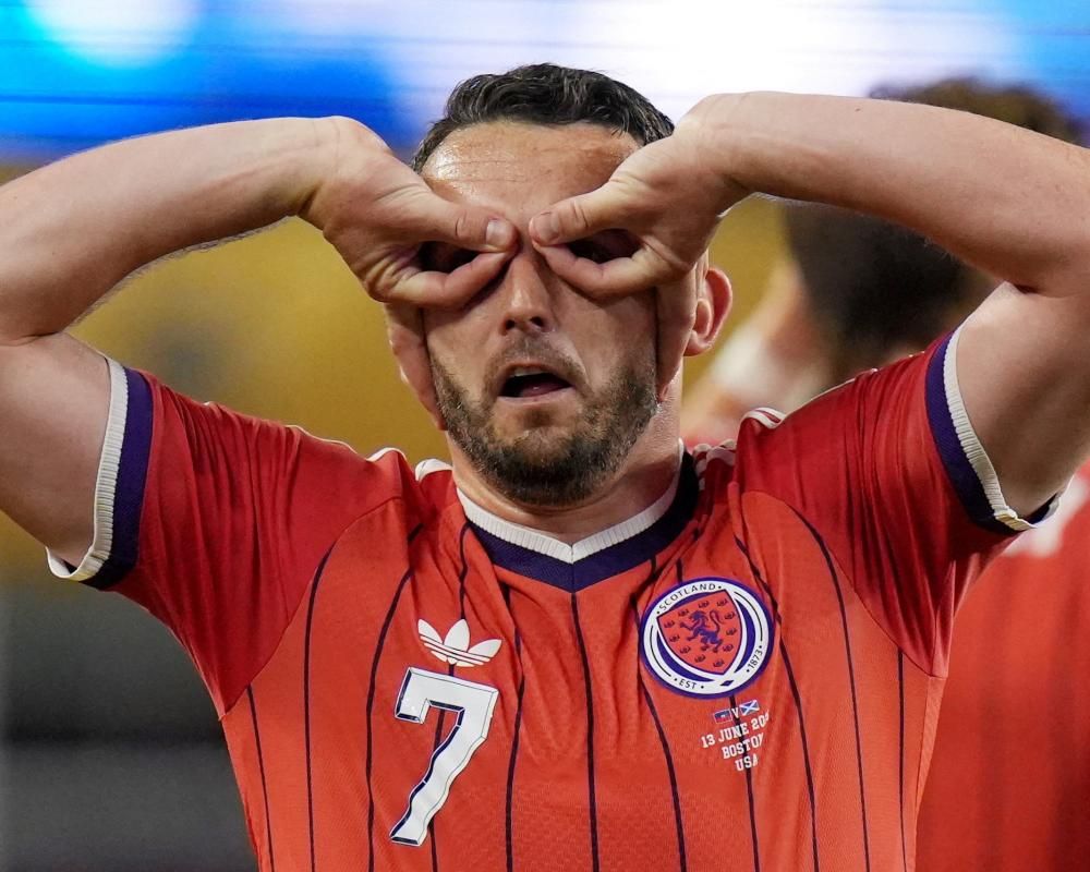 Scotland victorious on World Cup return after McGinn…
