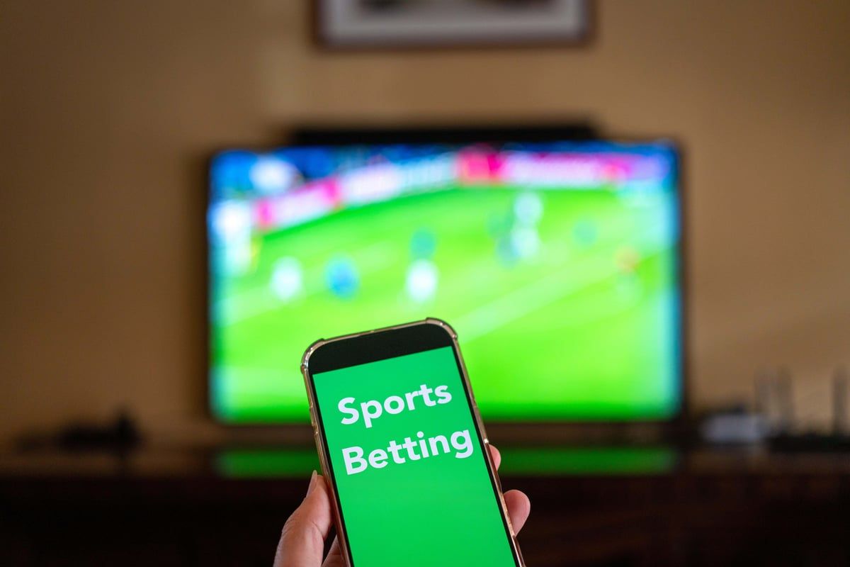 Gambling ads in football creating ‘tidal wave of…