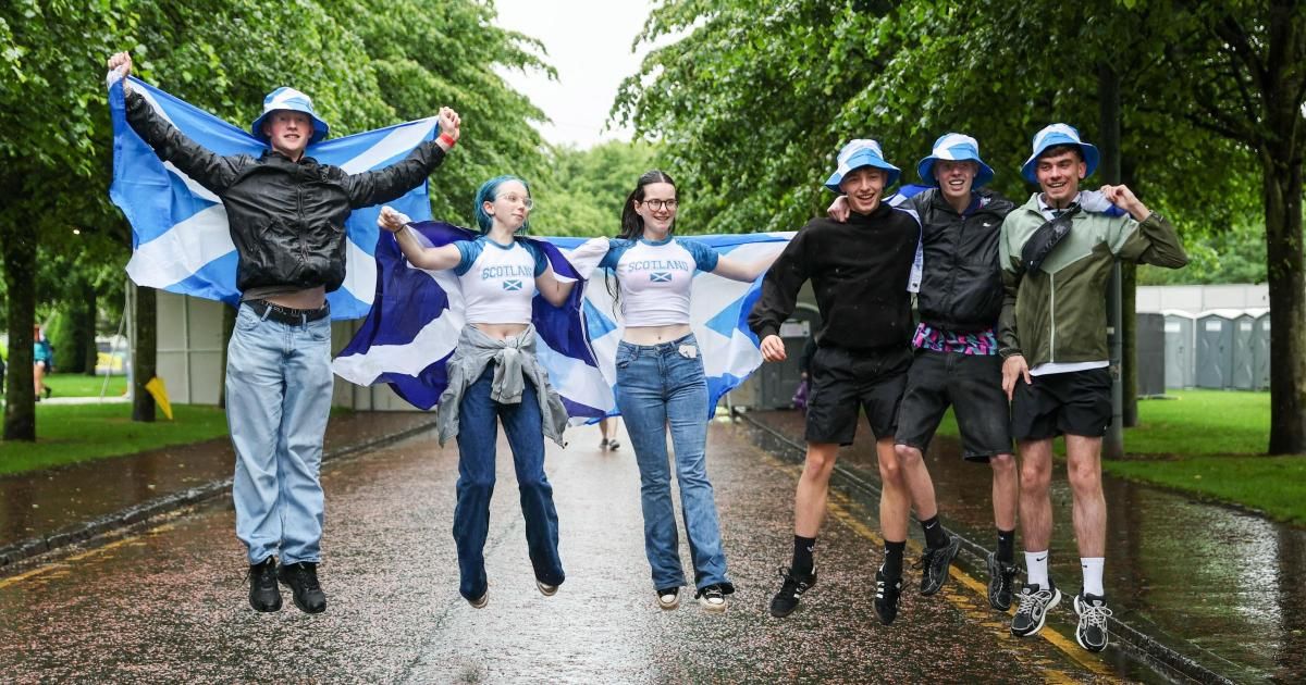 In pictures as rain fails to dampen spirits of…