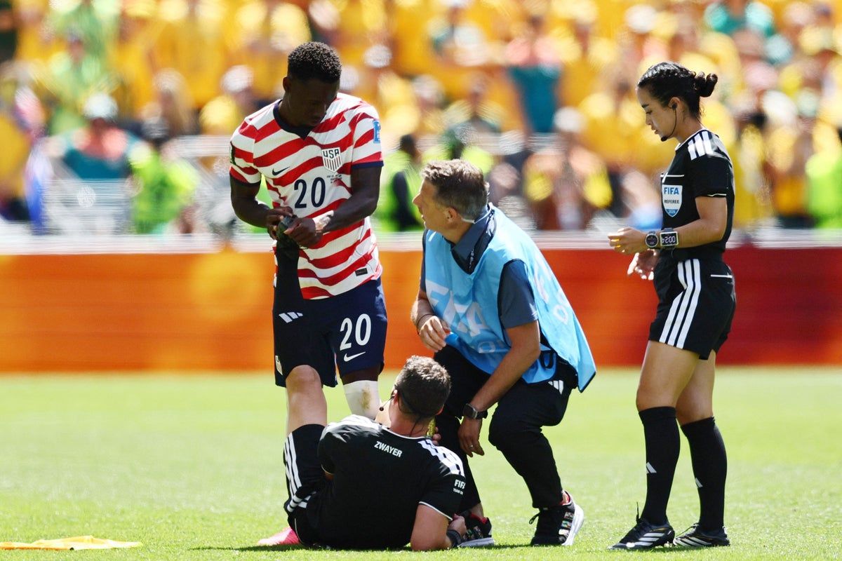 USA v Australia referee Felix Zwayer pulls up with…