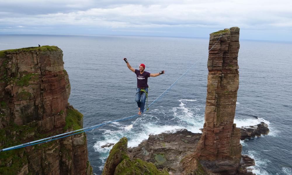 German adventurers perform high-wire walk along Old…