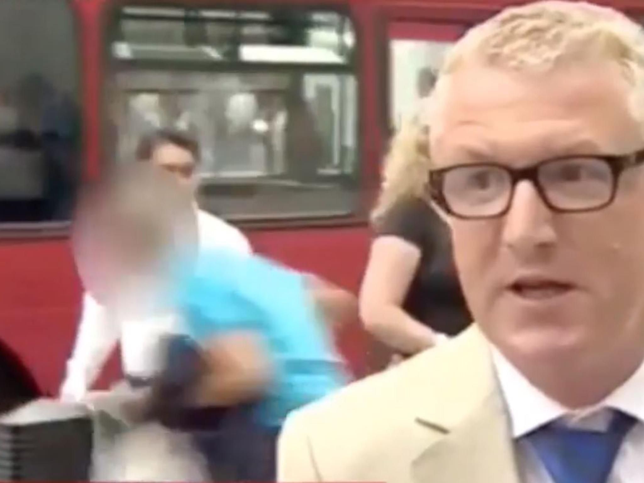 Man runs in front of London bus in middle of live BBC…