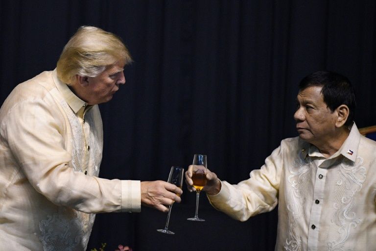 Philippines' Duterte all smiles as he meets Trump