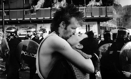 Two riots, two kissing couples, two decades apart