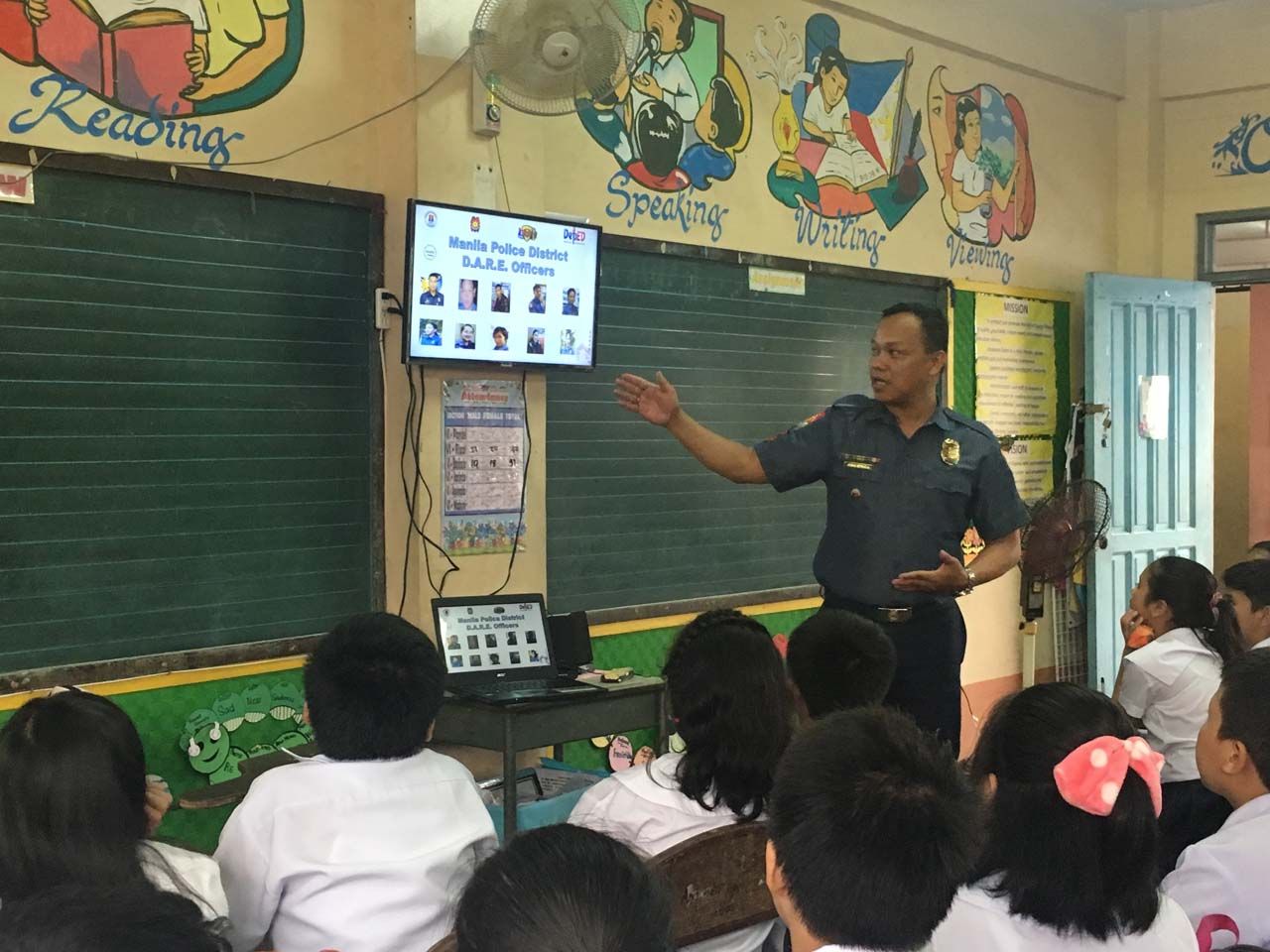 From guns to blackboards: Police officers teach kids…