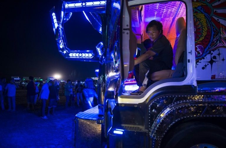 Anime, Michelin Man and Transformers: truck art…