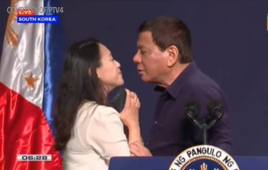 Philippine President Duterte condemned for kissing…