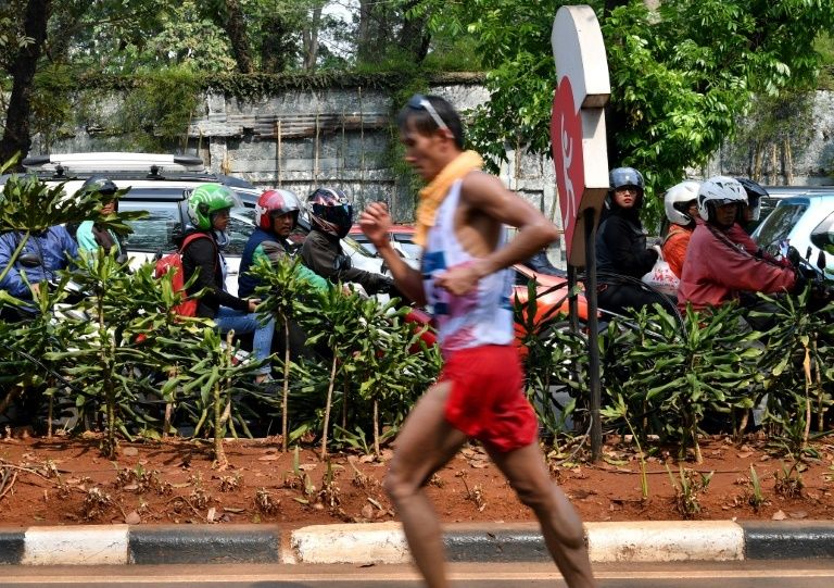 'This is Indonesia': race-walker collapses after 50km…