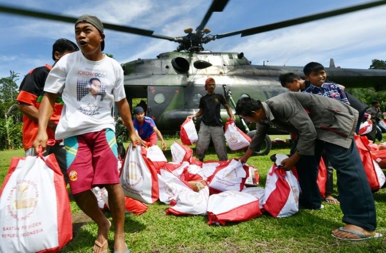Aid pours into Indonesian city stricken by…