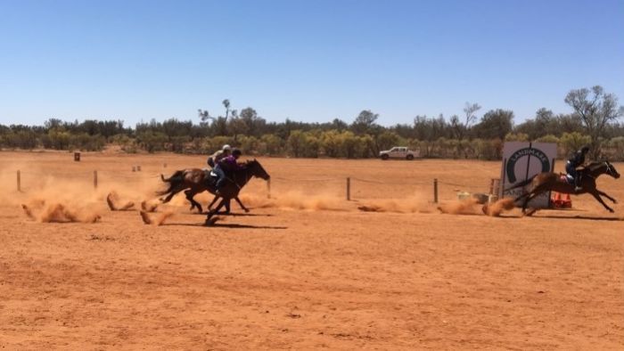 Outback red dirt race day remembers Dolly amid drought