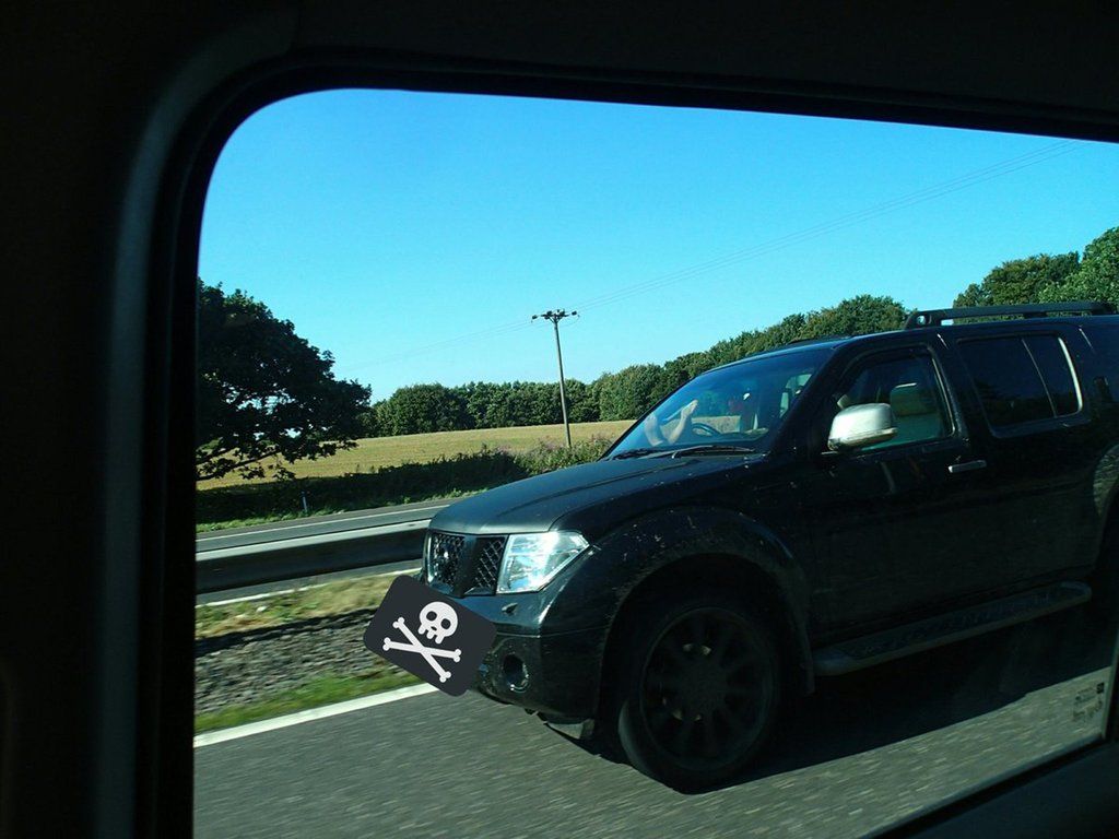 Police catch driver with bare feet on dashboard…