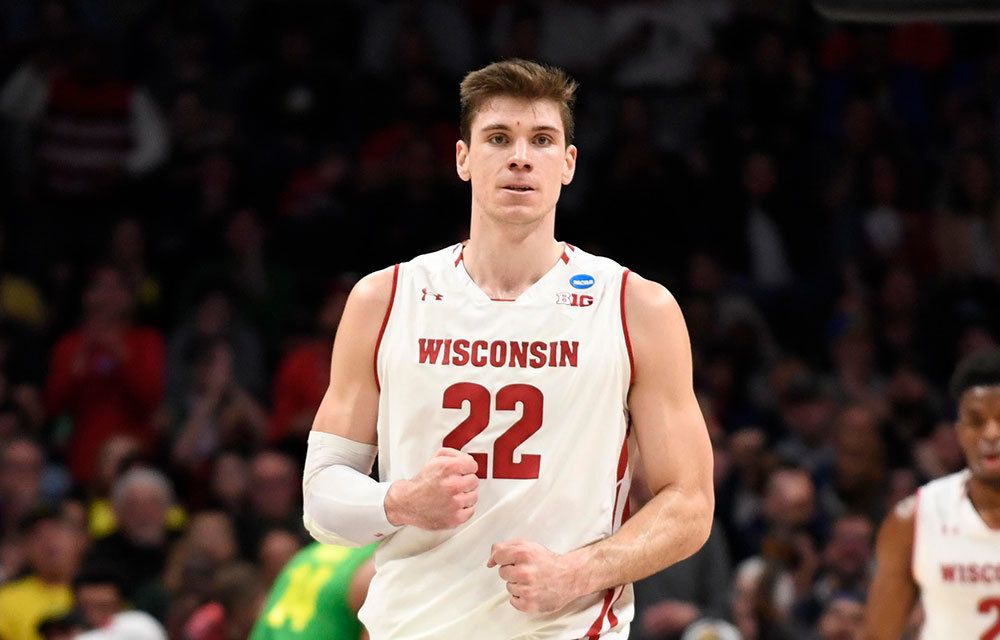 Wisconsin’s Ethan Happ took out his own bench to save…