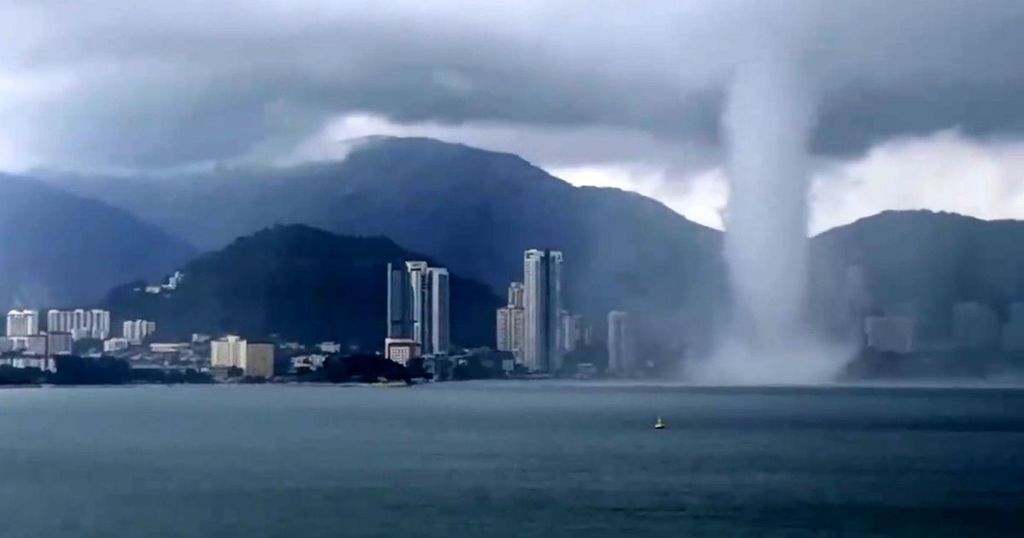 Apocalyptic water tornado speeds towards city leaving…