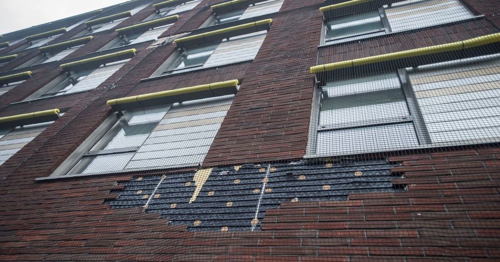 City centre apartment building is covered in flammable…