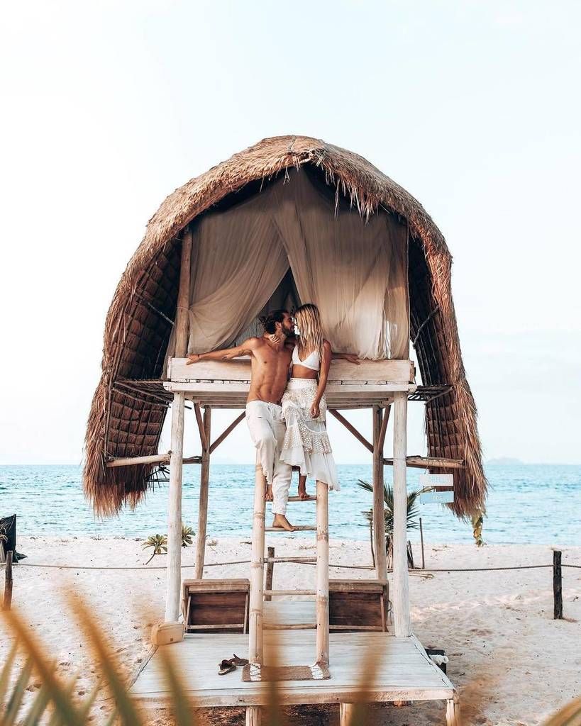 Travel couple expose ugly truth laid bare on pink beach