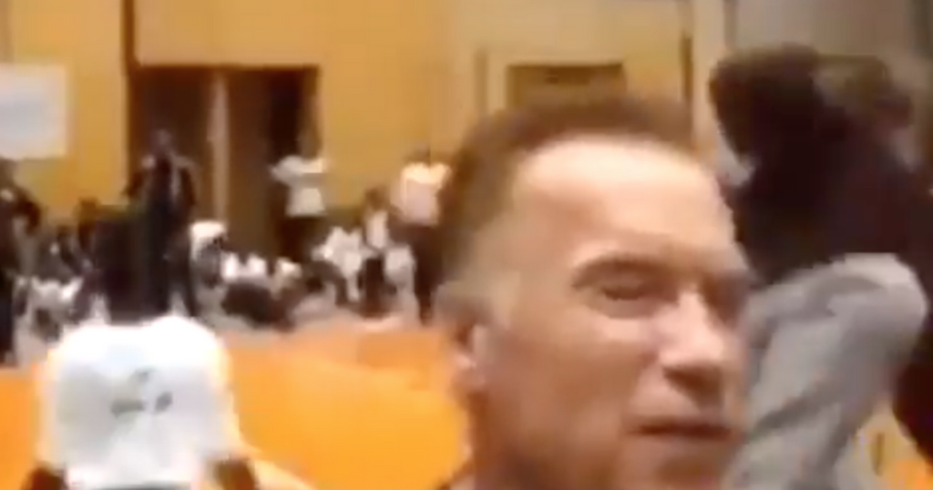 Arnold Schwarzenegger DROP-KICKED in back by cowardly…