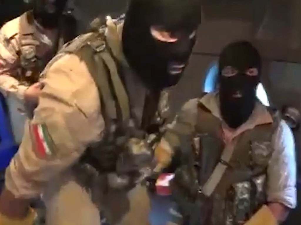 Moment masked Iranian combat troops stormed British…