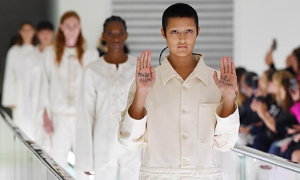 Gucci model stages mental health protest at Milan…