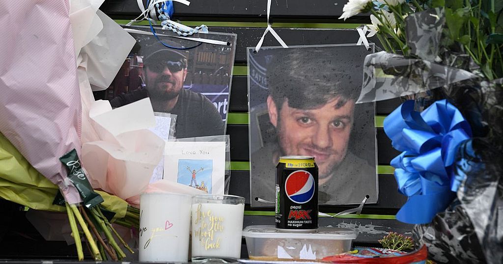 Can of Pepsi among flowers, candles and tributes left…