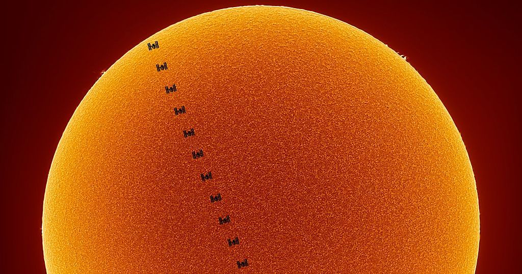 International Space Station crosses spotless sun in…