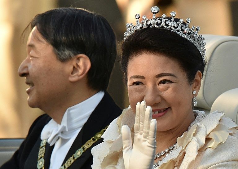 Cheering crowds greet Japan's new emperor in rare…