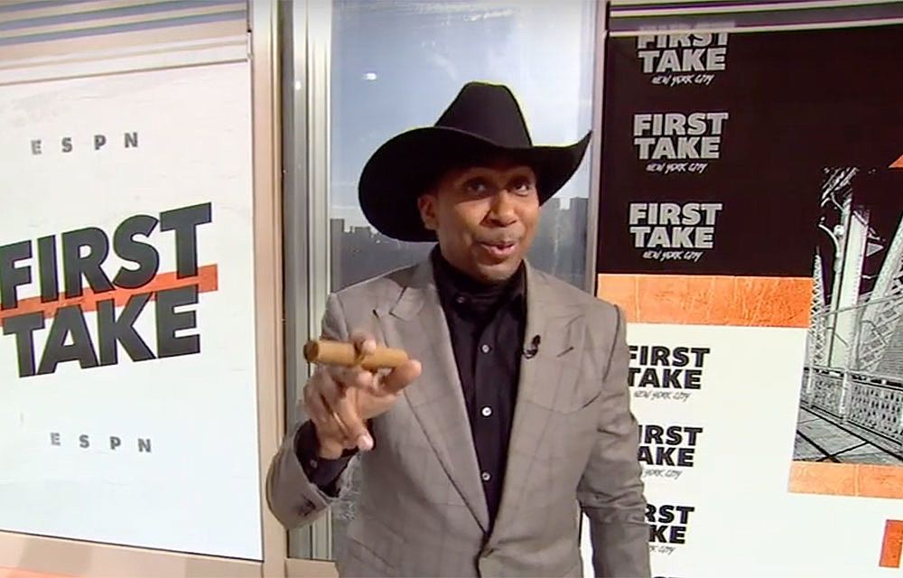 Stephen A. Smith celebrates Cowboys loss with a cigar