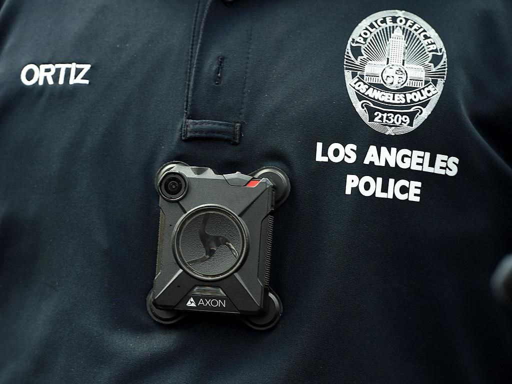 Police officer caught on body-cam 'fondling dead…