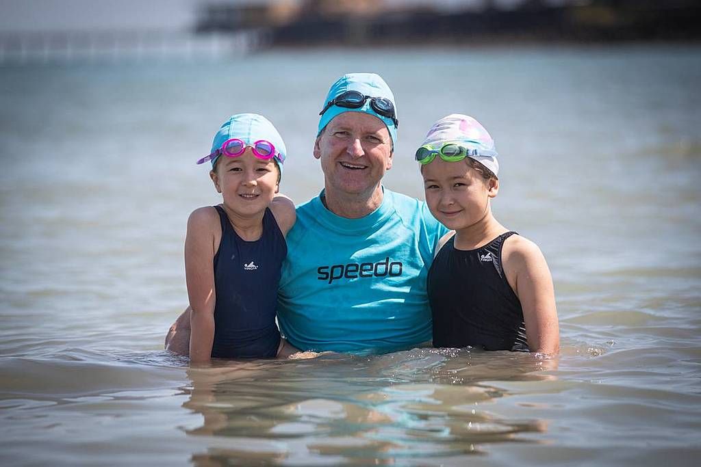 Ready, set, swim: Seven-year-old lines up with…
