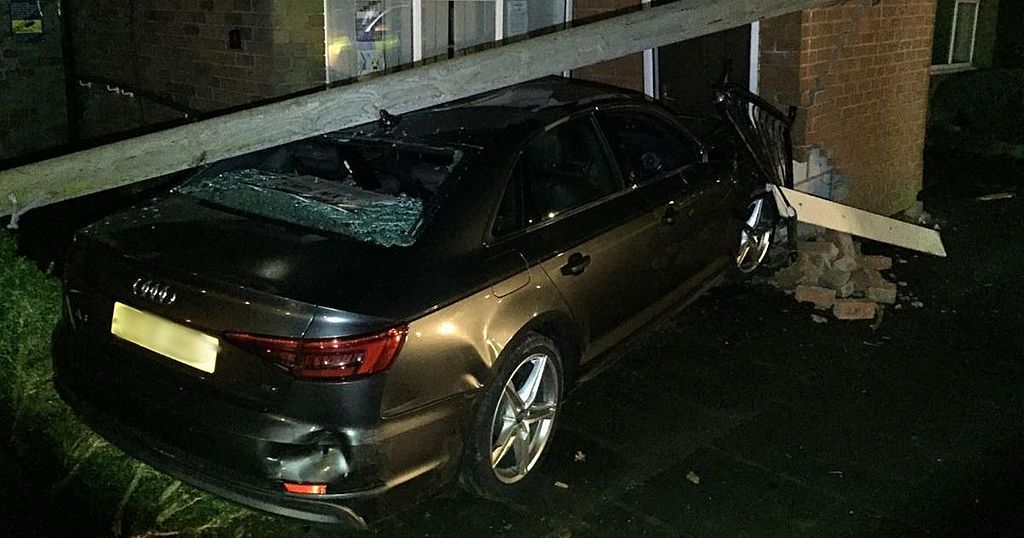 Suspected stolen Audi crashes into offices on Bolton…